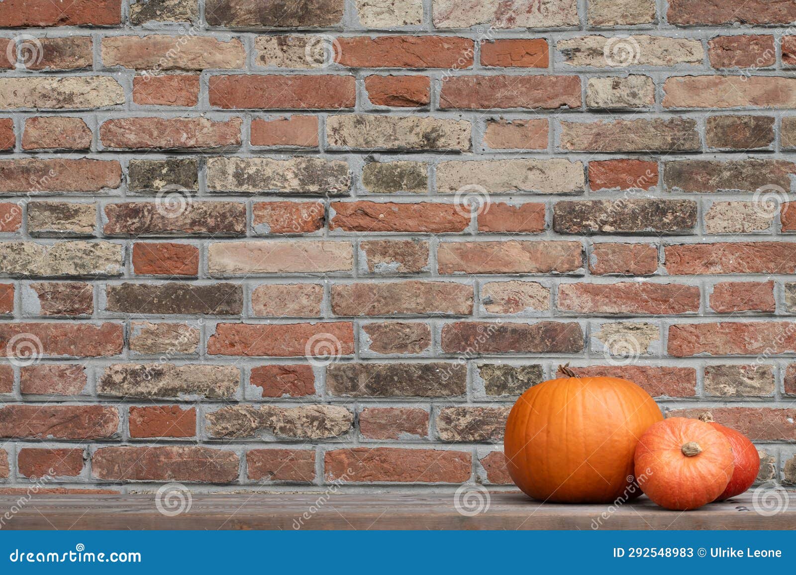 Background of a Wall Made of Red Fired Bricks with Three Orange ...
