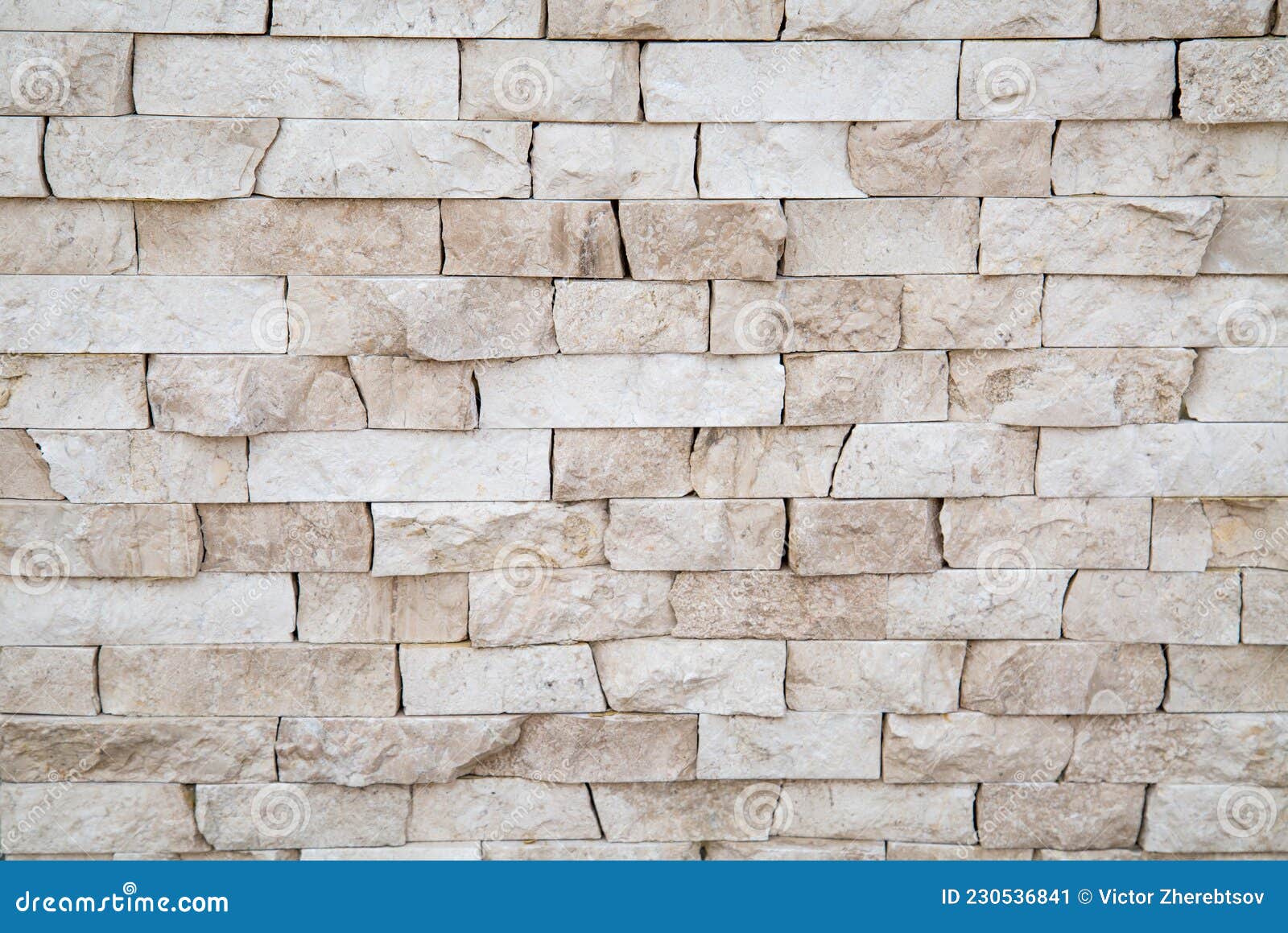 The Background of the Wall is Made of Strips of Natural Cream Marble ...