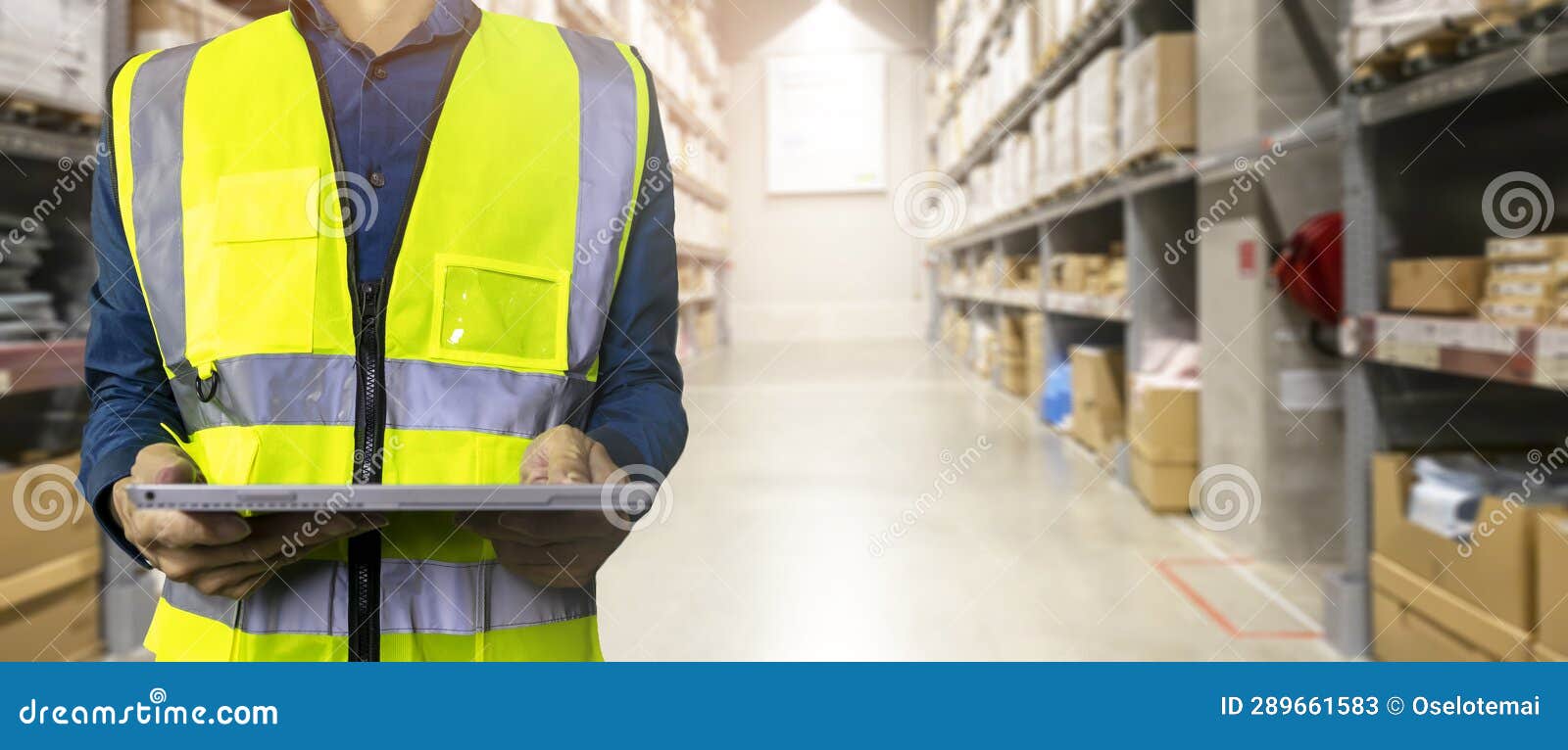 On a Background of a Warehouse, a Straight-facing Man in an Engineer ...