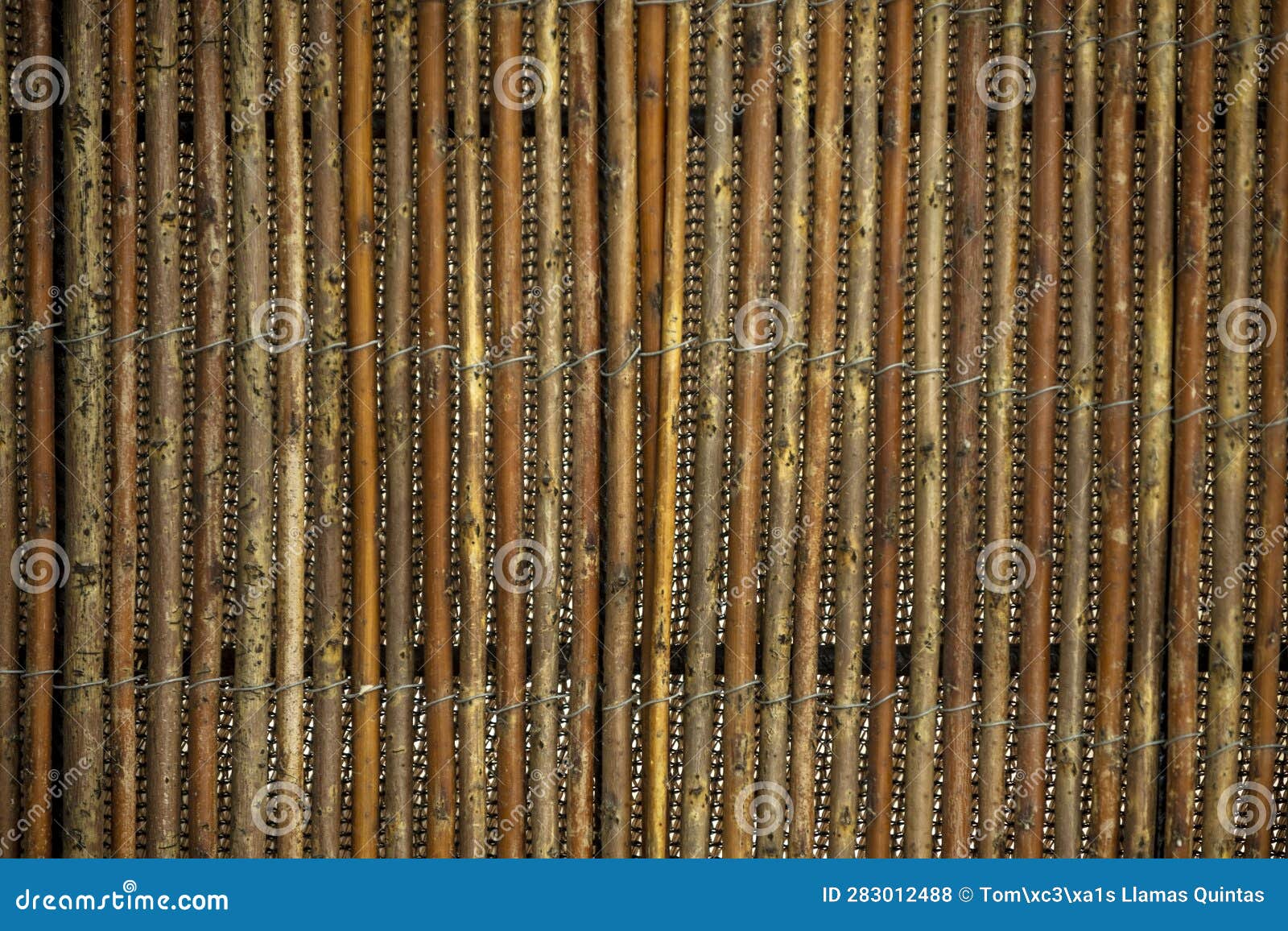 A Background of Wooden Reeds Held Together with Wire Stock Photo ...