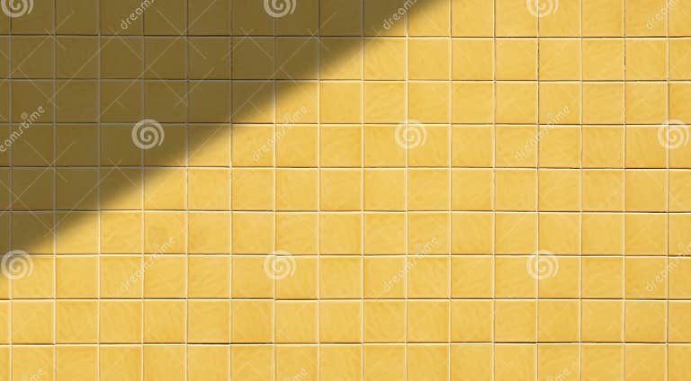 Background of Yellow Square Tile Wall Pattern with Light and Shadow on ...