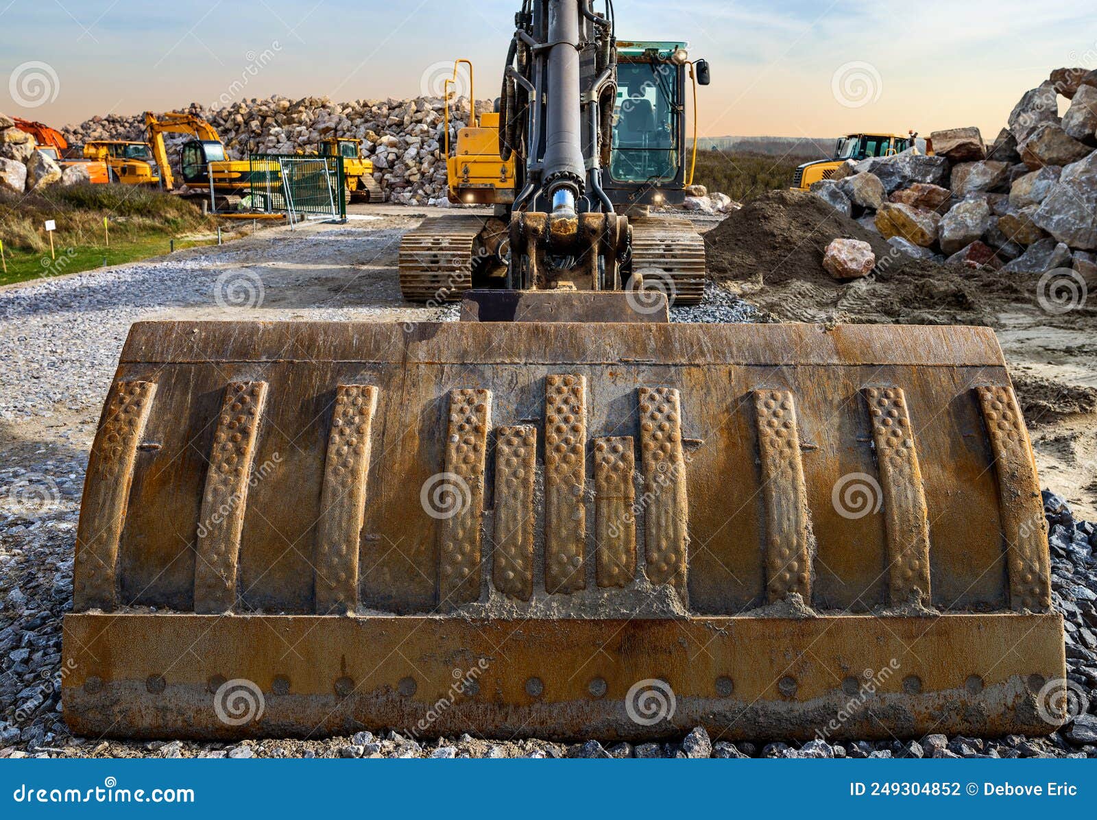 Backhoe in Action on a Construction Site Close Up Stock Photo - Image ...