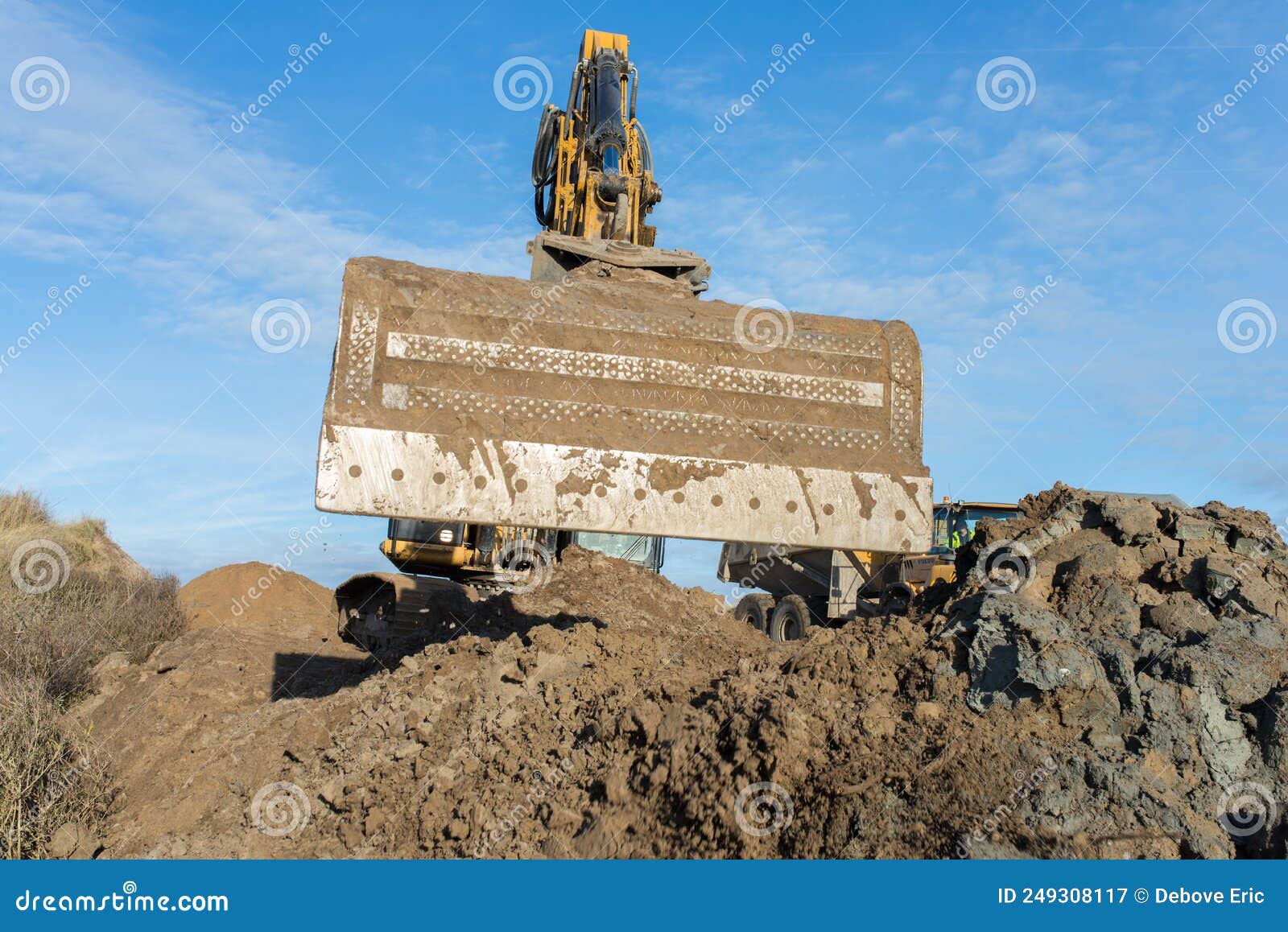 Backhoe in Action on a Construction Site Close Up Stock Image - Image ...