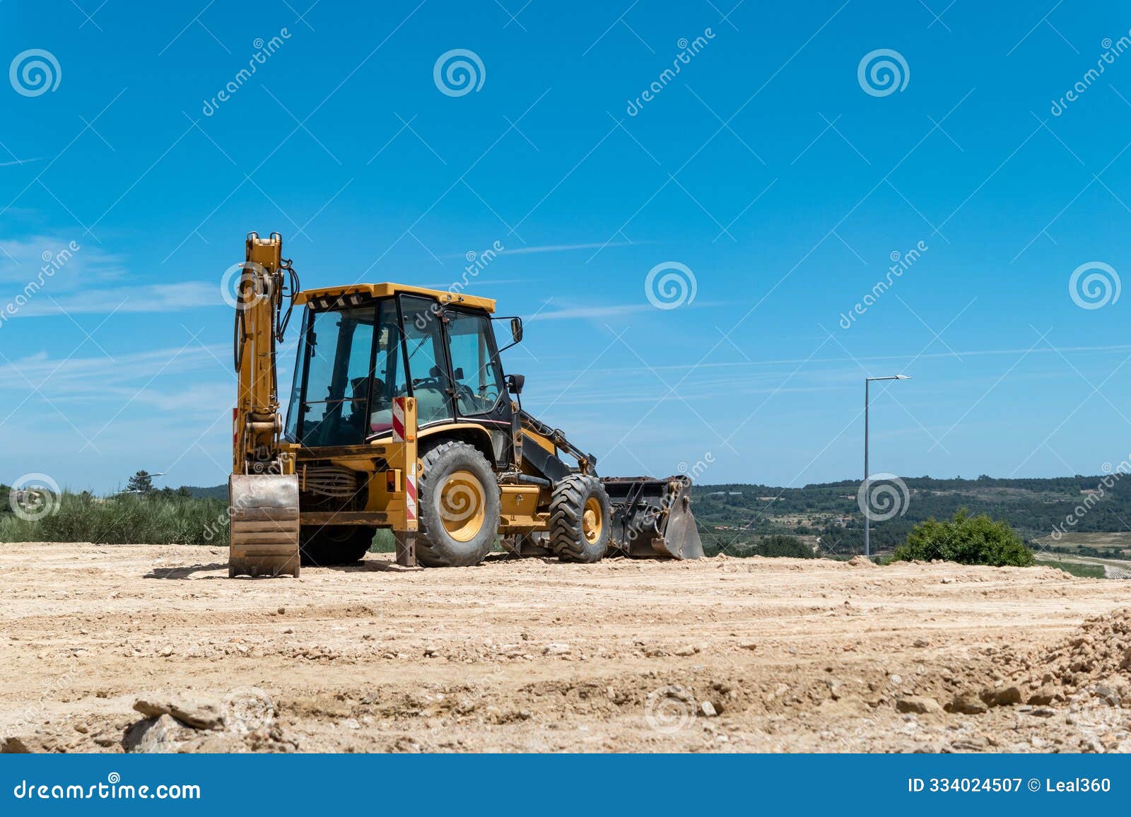 Backhoe in Action for Leveling and Building Lots Stock Image - Image of ...