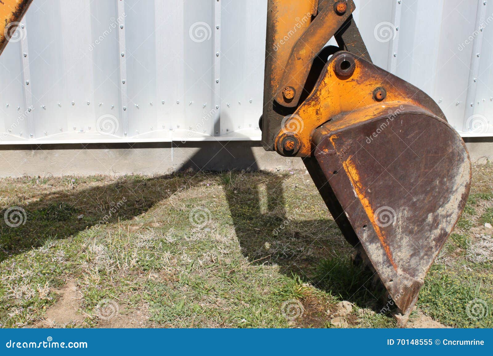 Backhoe Bucket by Metal Building Stock Image - Image of bucket ...