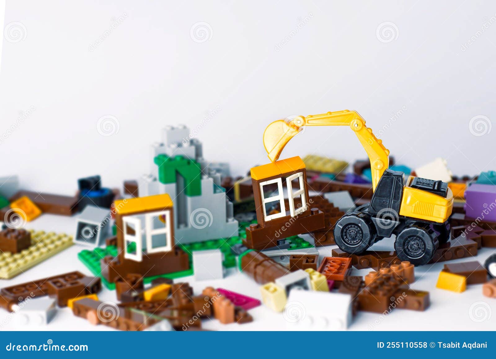 Backhoe and brick toys stock photo. Image of brick, screenshot - 255110558