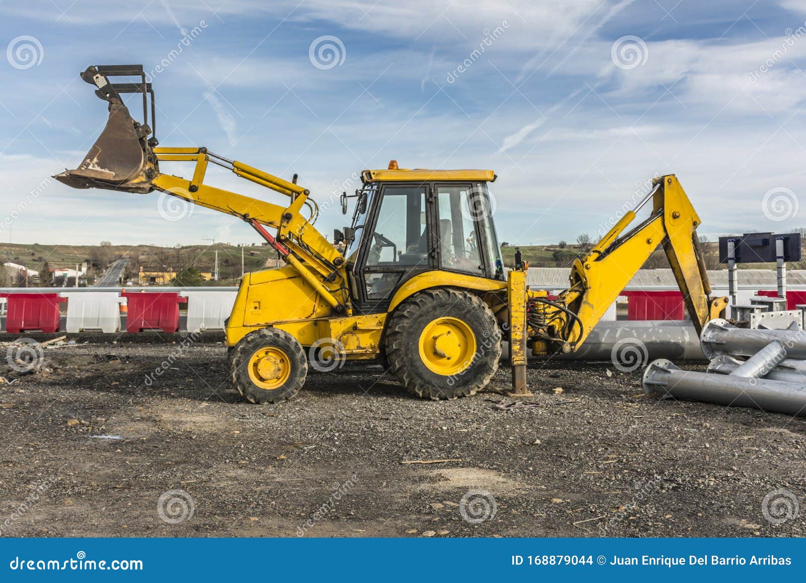Backhoe in the Construction of a Roundabout with Different Construction ...