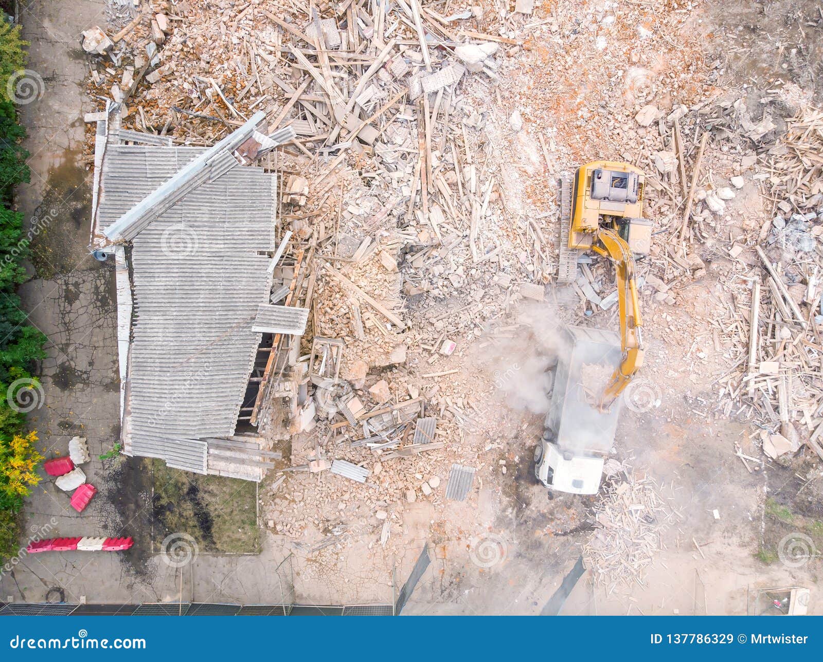 Backhoe is on Debris from the Demolition. Aerial View Stock Image ...