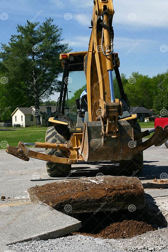 Backhoe Doing Road Work stock photo. Image of tool, asphalt - 53405450