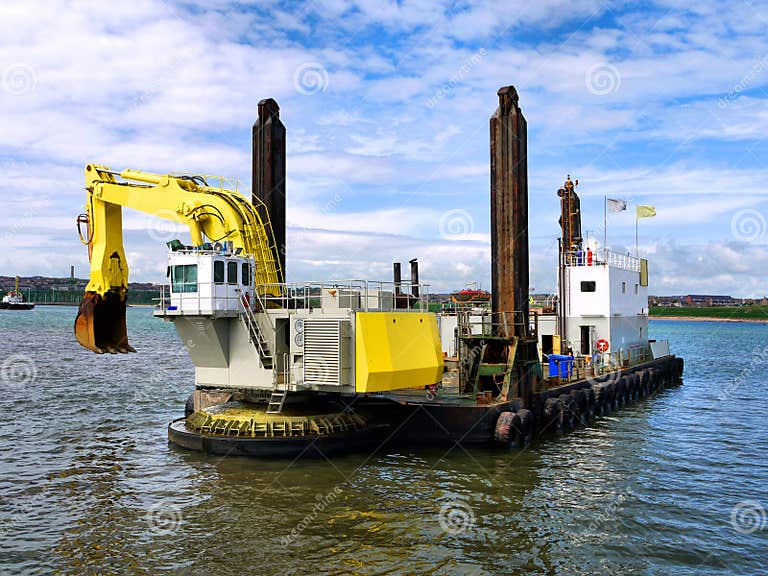 Backhoe Dredger Beginning Dredging Operations. Stock Photo - Image of ...