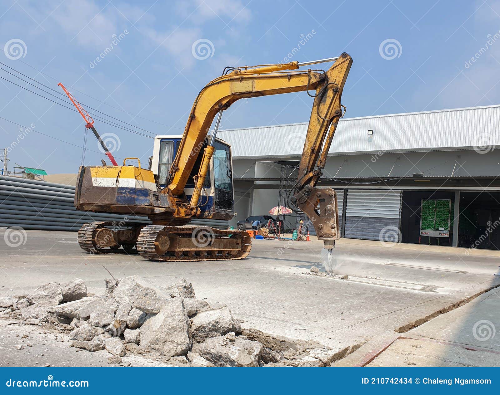 The Backhoe Drill the Floor To Make the Base of the Roof Structure ...