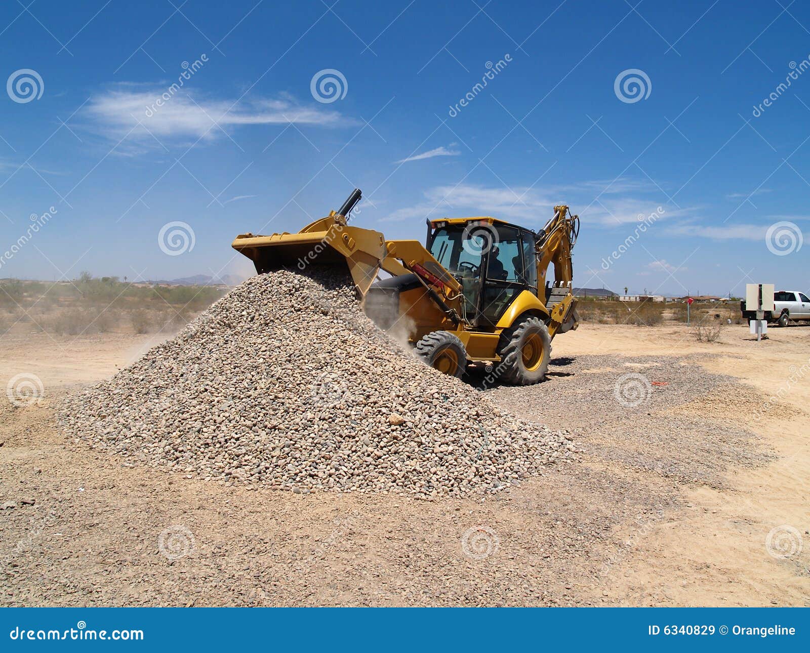 Backhoe Shoveling Gravel Royalty-Free Stock Photo | CartoonDealer.com ...