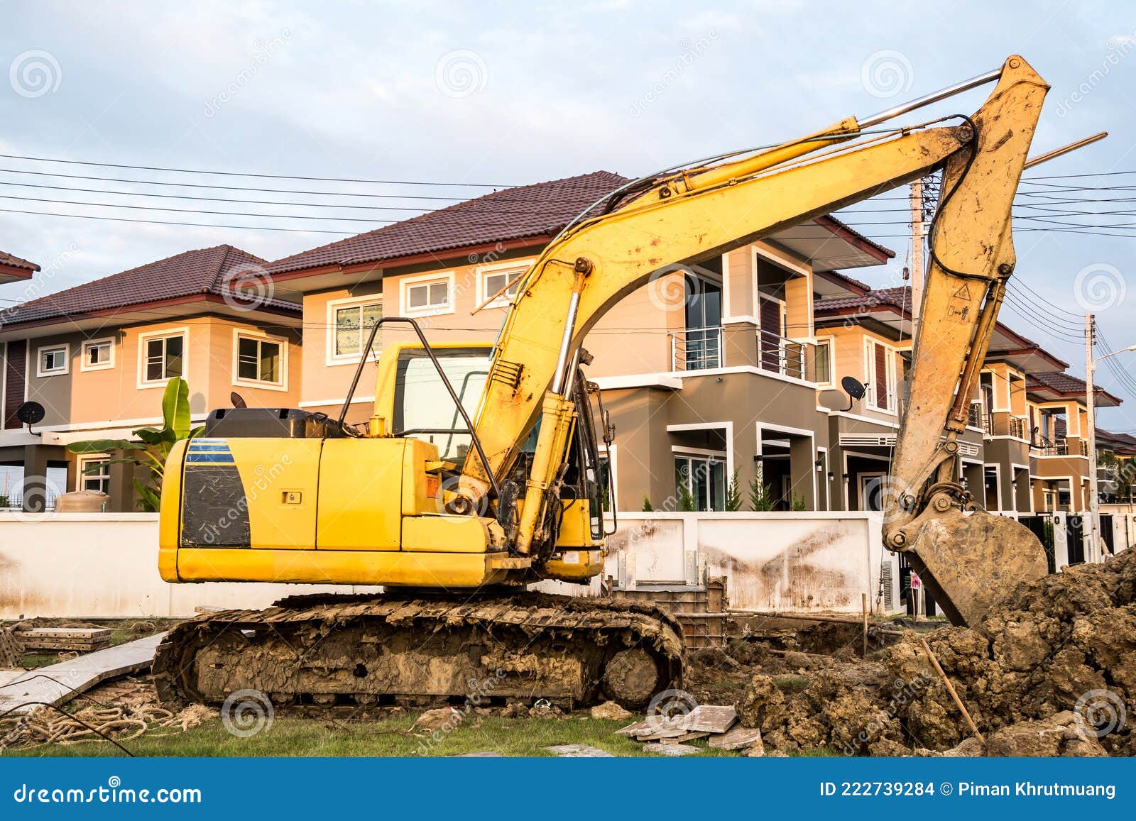 Backhoe Excavator at House Construction Site Stock Photo - Image of ...
