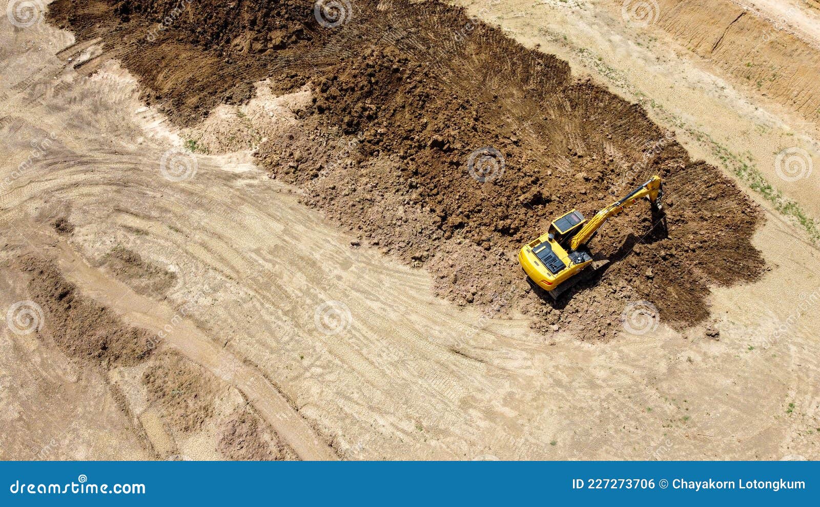 Backhoe or Excavator Scraping a Layer of Soil Stock Photo - Image of ...
