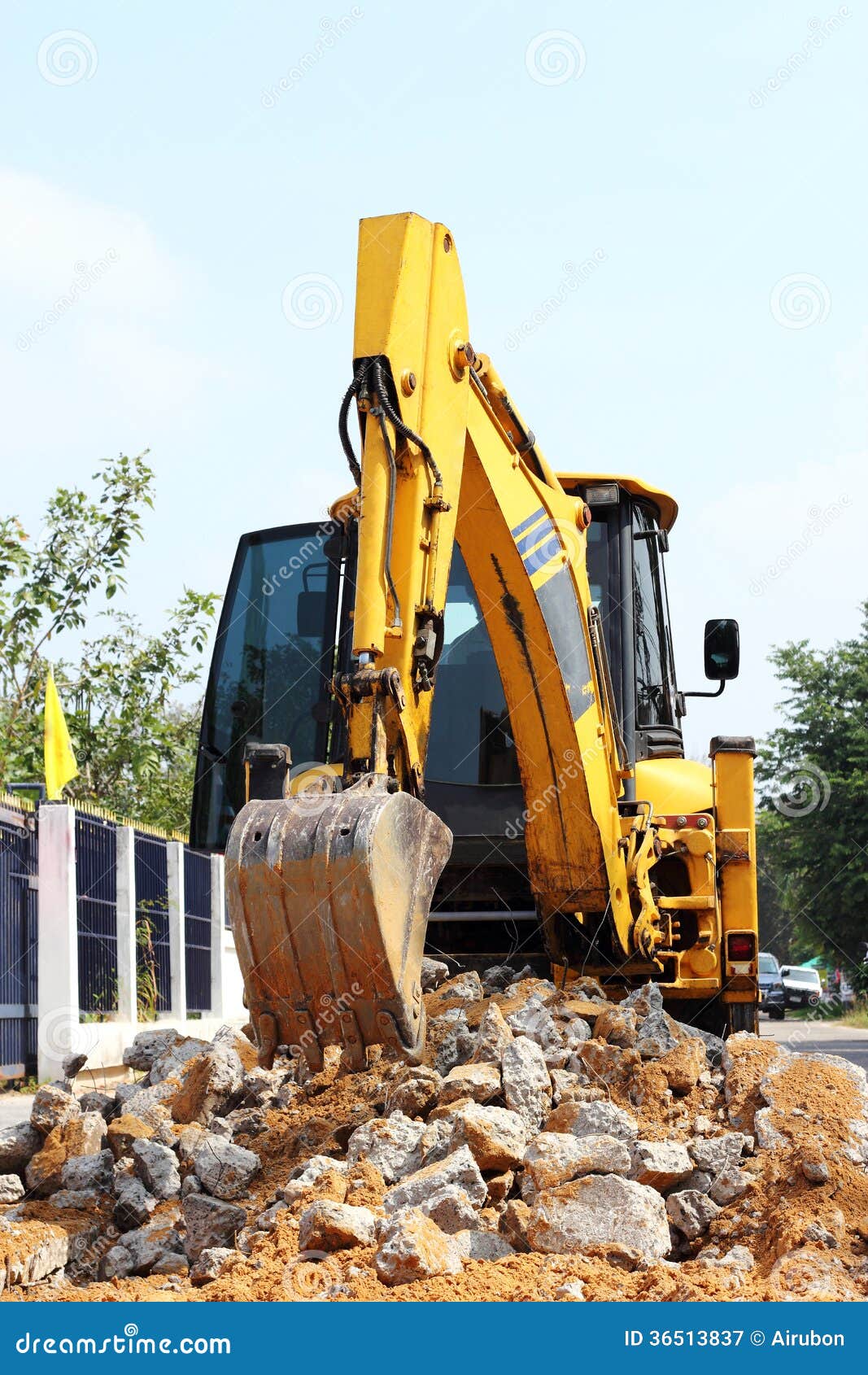 Backhoe Loader Soil From The Ground Up To Dump Truck Stock Photo ...