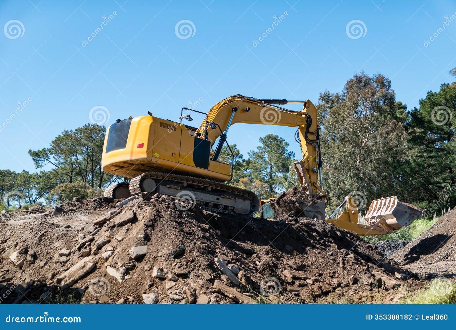 Backhoe Loader Loading Gravel for Crusher Stock Photo - Image of track ...