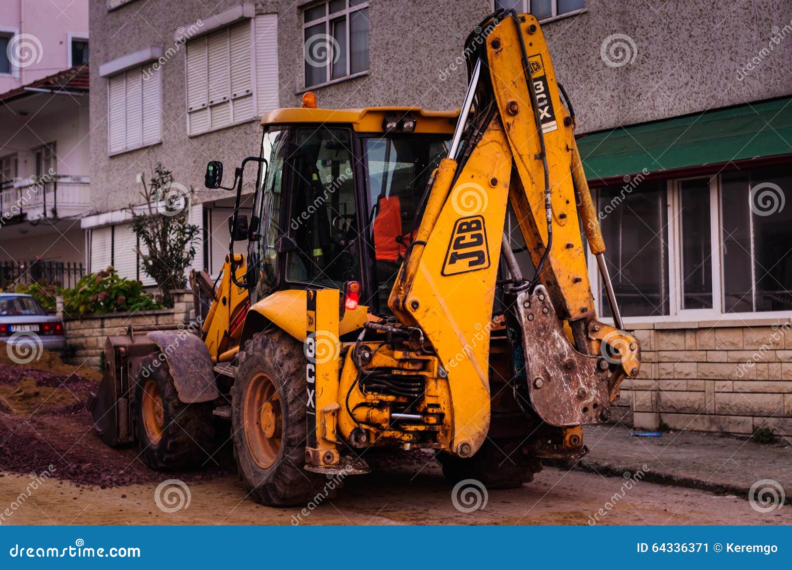 Backhoe Loader in a Street editorial photo. Image of backhoe - 64336371