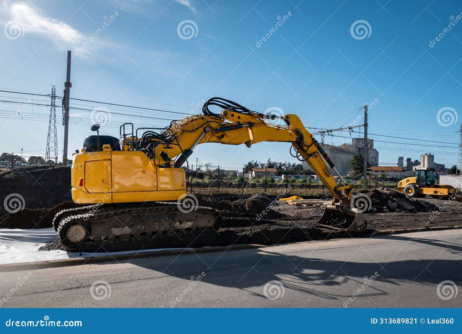 Backhoe Loader Leveling the Soil for Drainage Stock Image - Image of ...