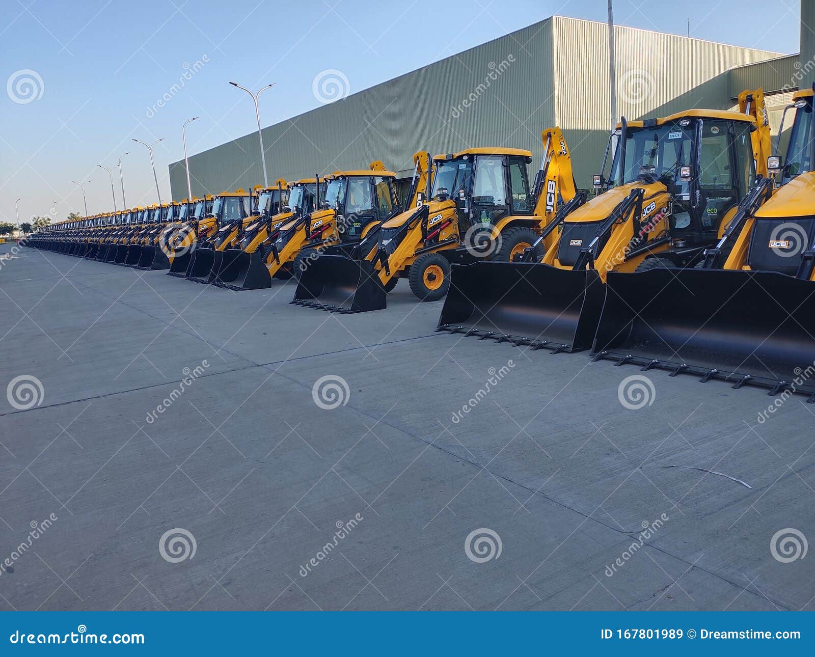 Backhoe Loaders Stand in a Line. Stock Image - Image of stand, items ...