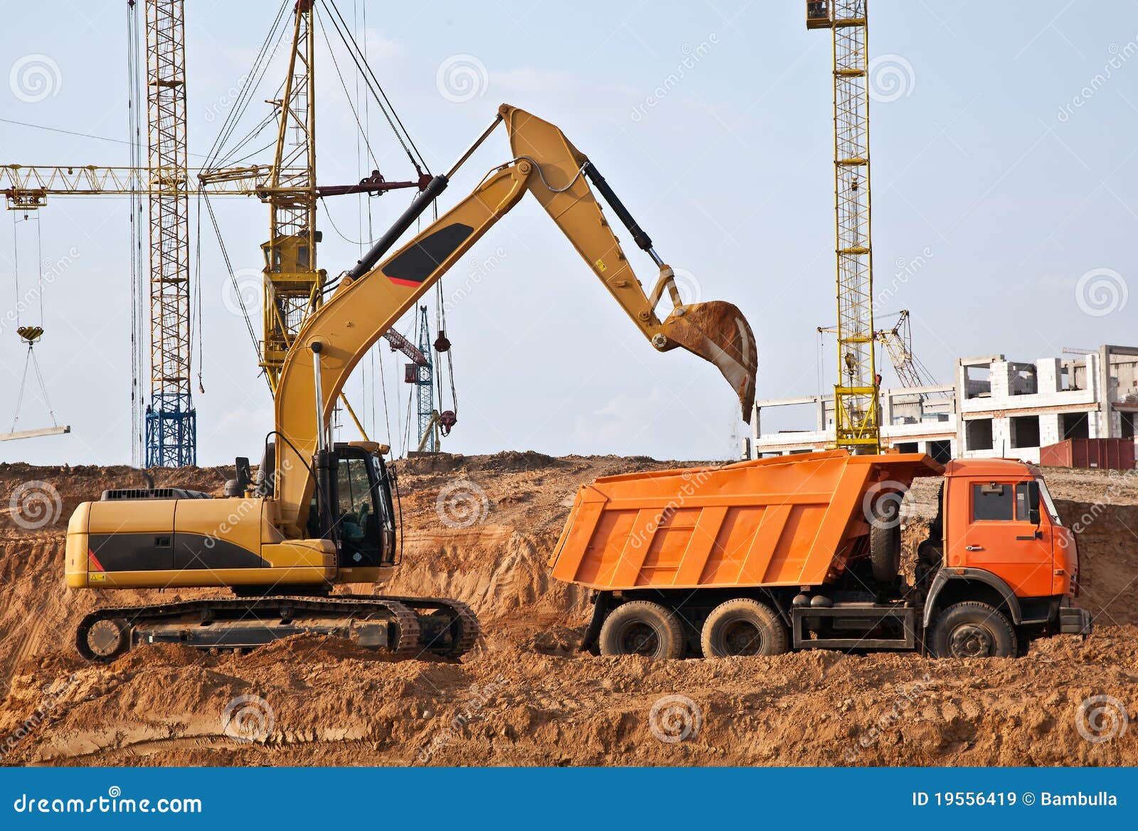 Backhoe Loading a Dump Truck Stock Image - Image of loader, activity ...