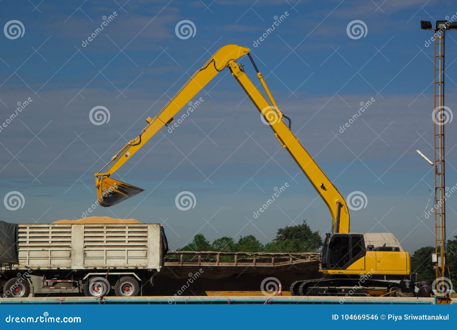 Backhoe Loading a Dump Truck Stock Photo - Image of construction, build ...