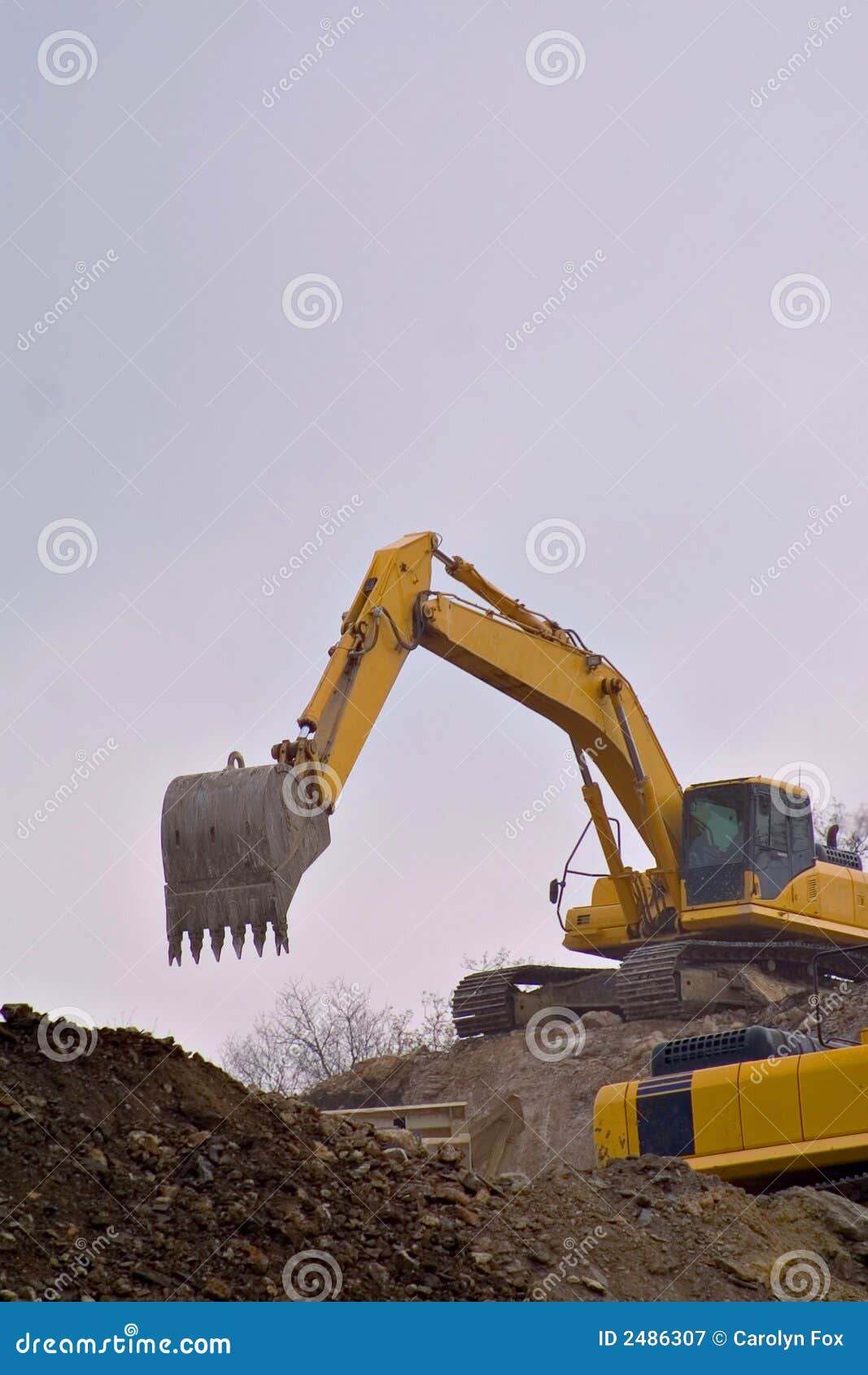 Backhoe moving dirt stock image. Image of machine, backhoe - 2486307