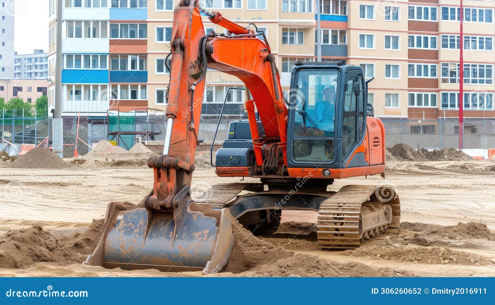 The Backhoe S Tracks Leave Deep Imprints in the Ground, a Testament To ...
