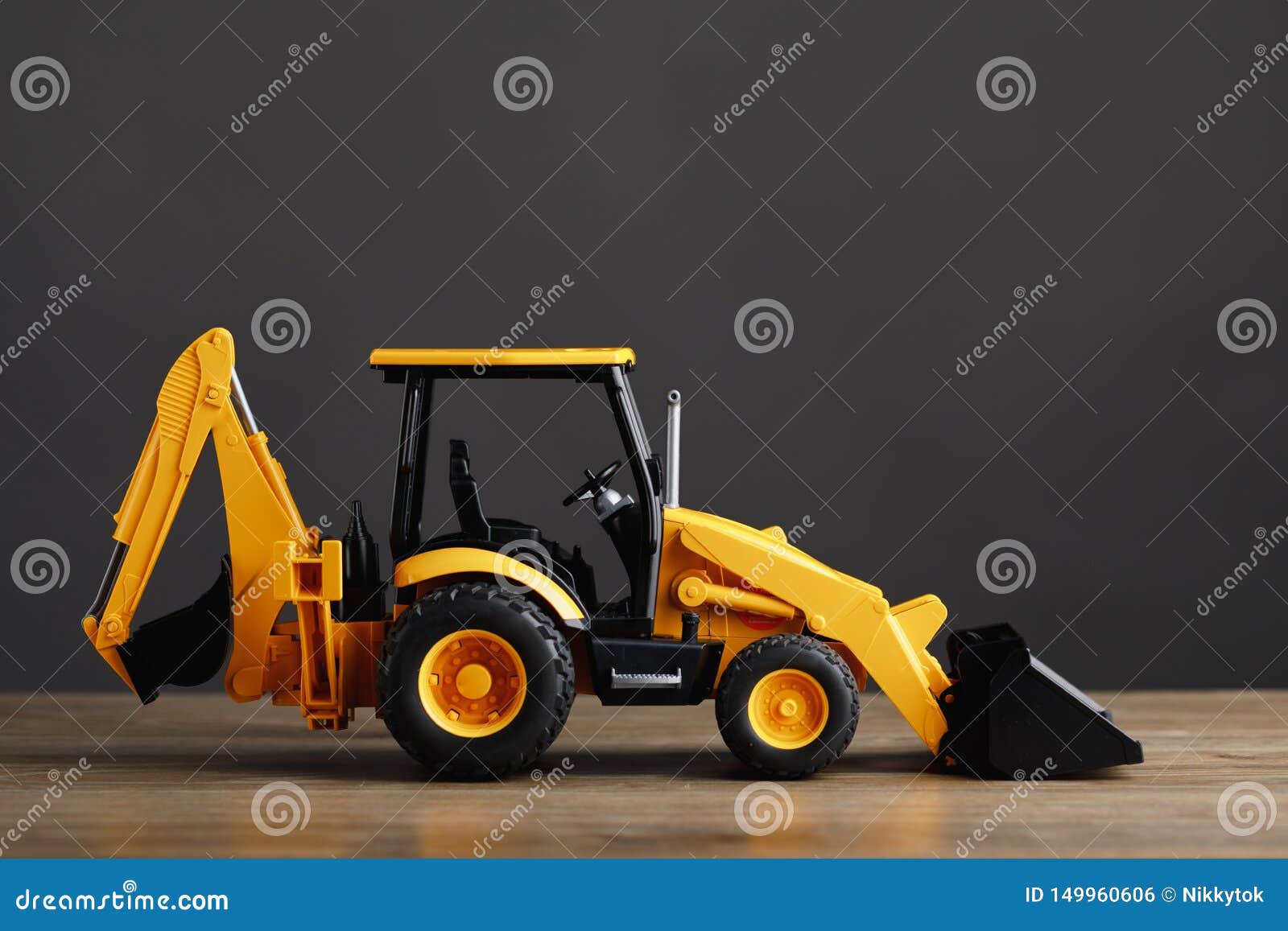 Backhoe tractor toy stock photo. Image of equipment - 149960606