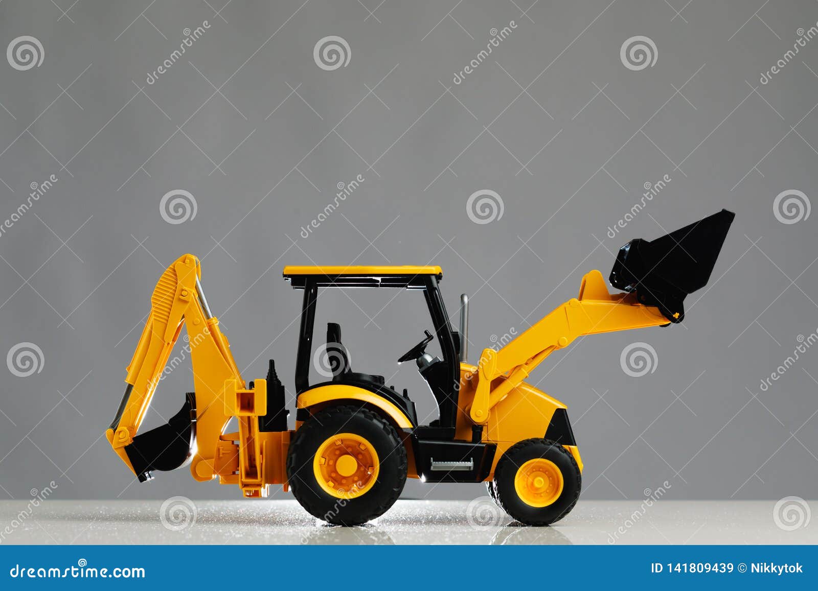 Backhoe Tractor Silhouette, Orange Background Royalty-Free Stock Photo ...