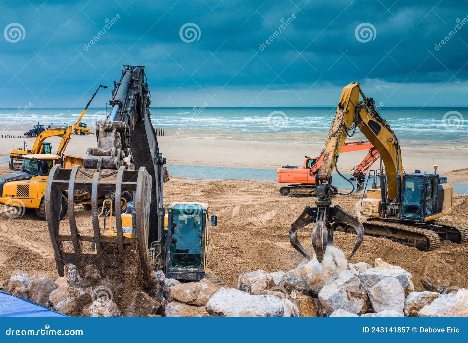 Large Hydraulic Excavators Working As a Team on a Construction Site ...