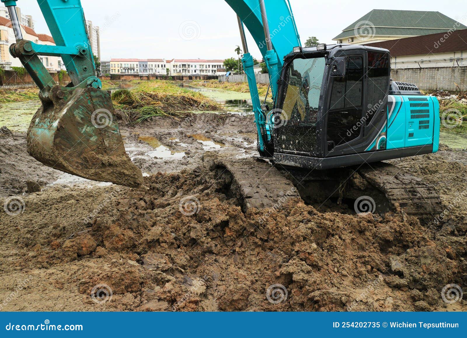 Green Backhoe Working on Dirt Stock Image - Image of wheel, crawler ...