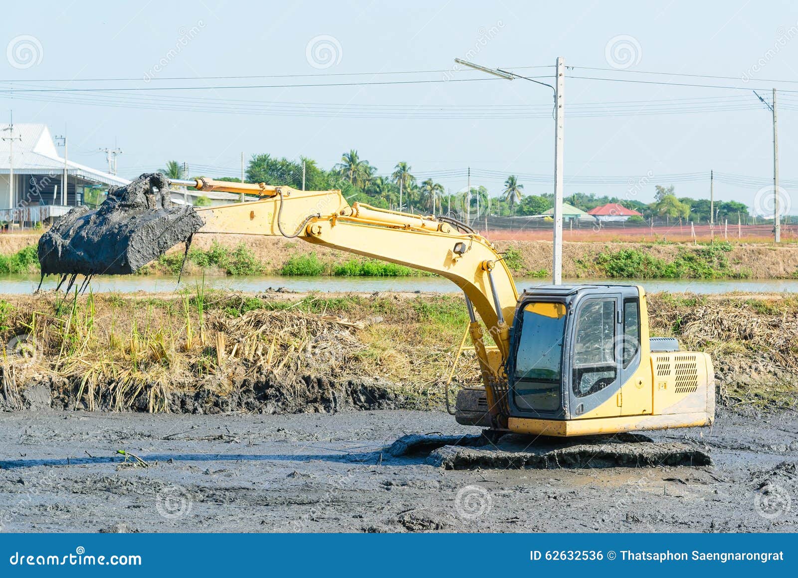 Backhoe Working in Mud Swamp Stock Photo - Image of mining, excavator ...