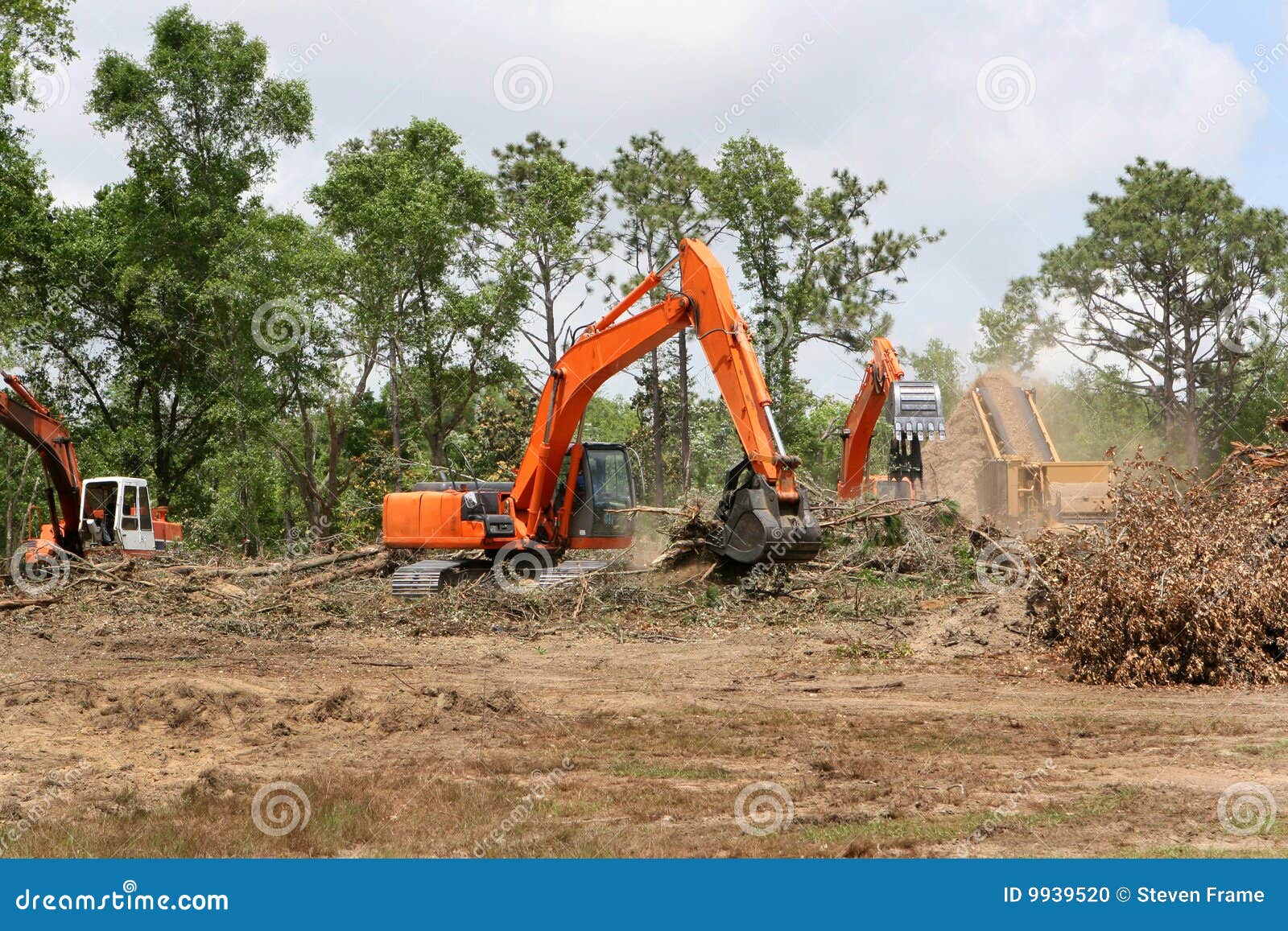 Backhoes Clearing Land stock photo. Image of chipper, building - 9939520
