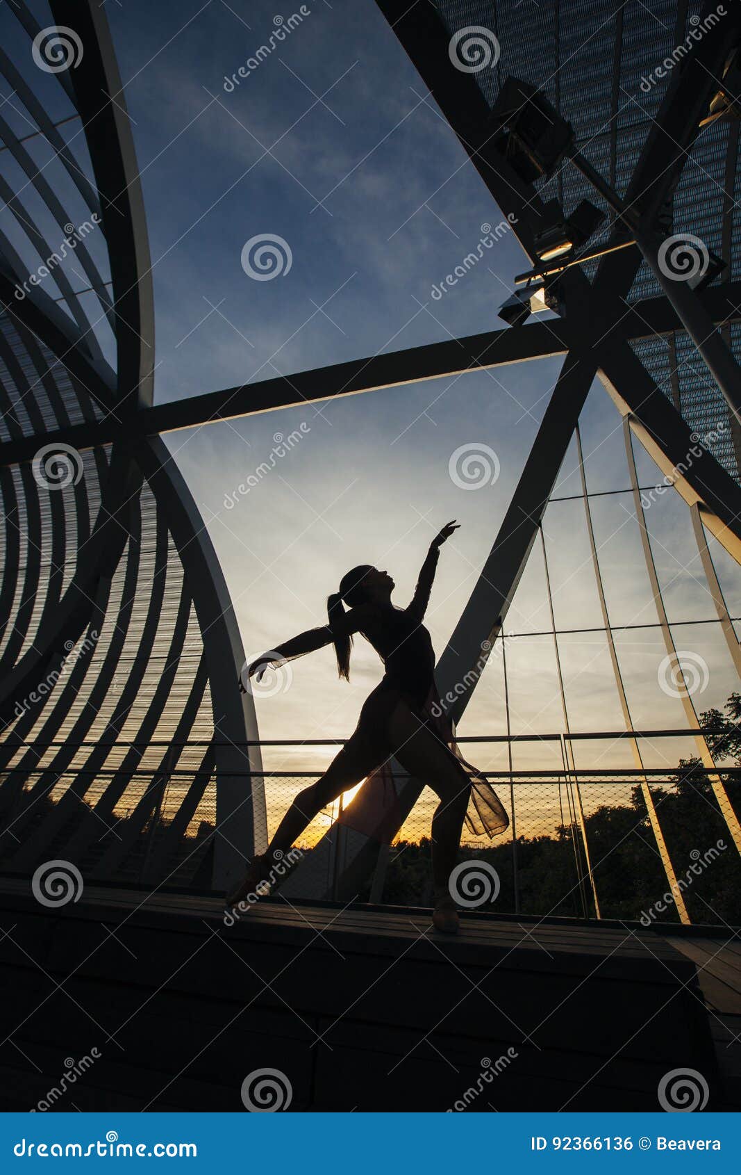 Backlight Image of a Woman Dancing Ballet on a Bridge Stock Photo ...