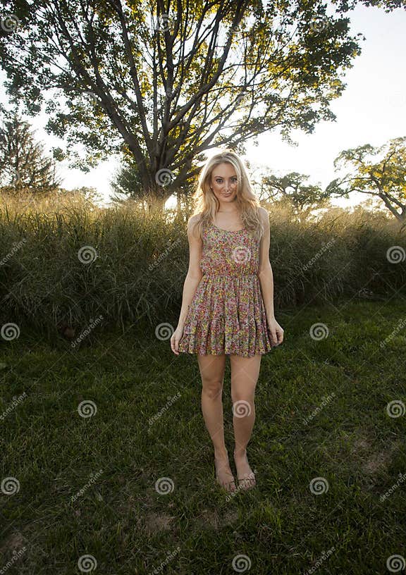 Backlit Blond in Sun Dress stock image. Image of blue - 21588831