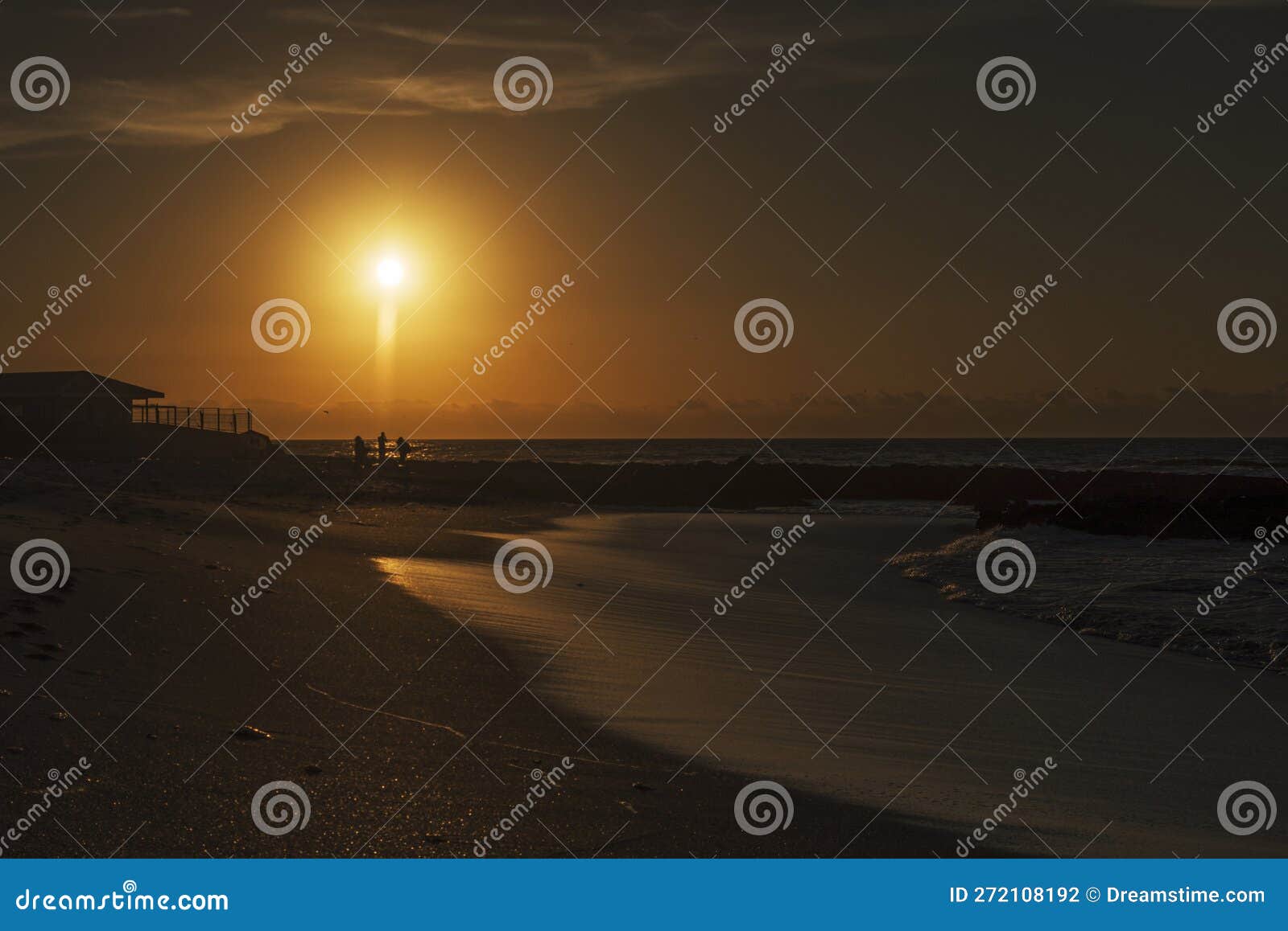 Backlit People Walking on the Beach at Sunset Stock Photo - Image of ...