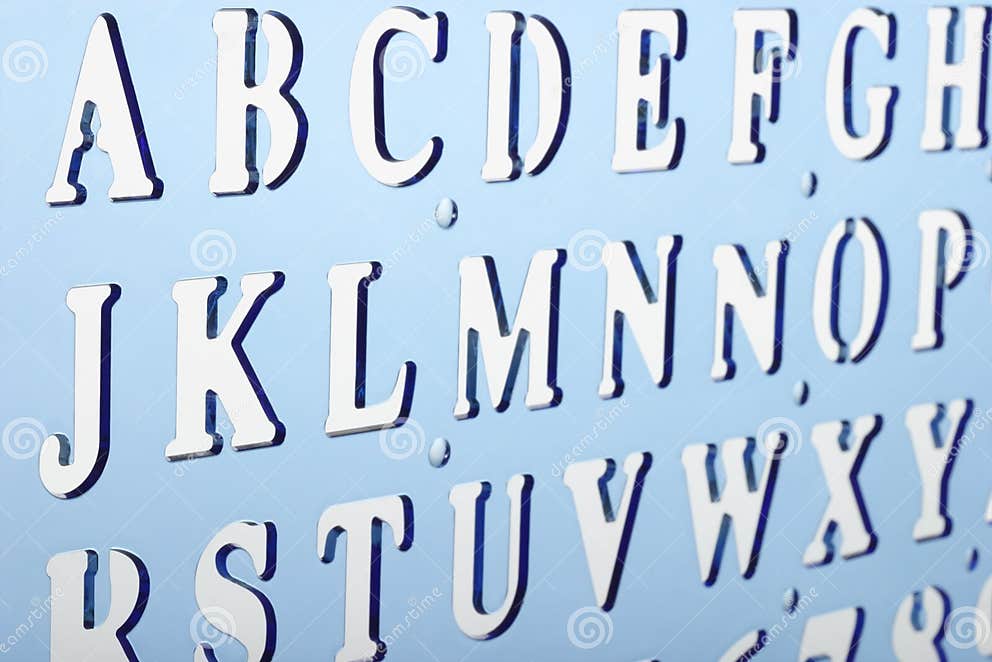 Backlit Plastic Alphabet Stencil Stock Photo - Image of supplies ...