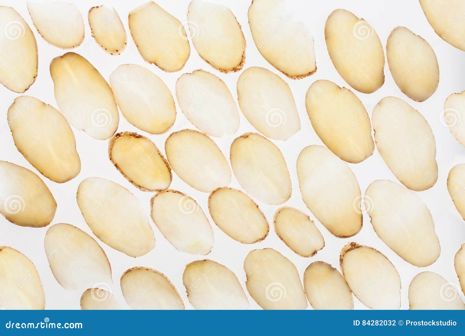 Backlit Slices of Raw Potato, Abstract Textured Background Stock Photo ...