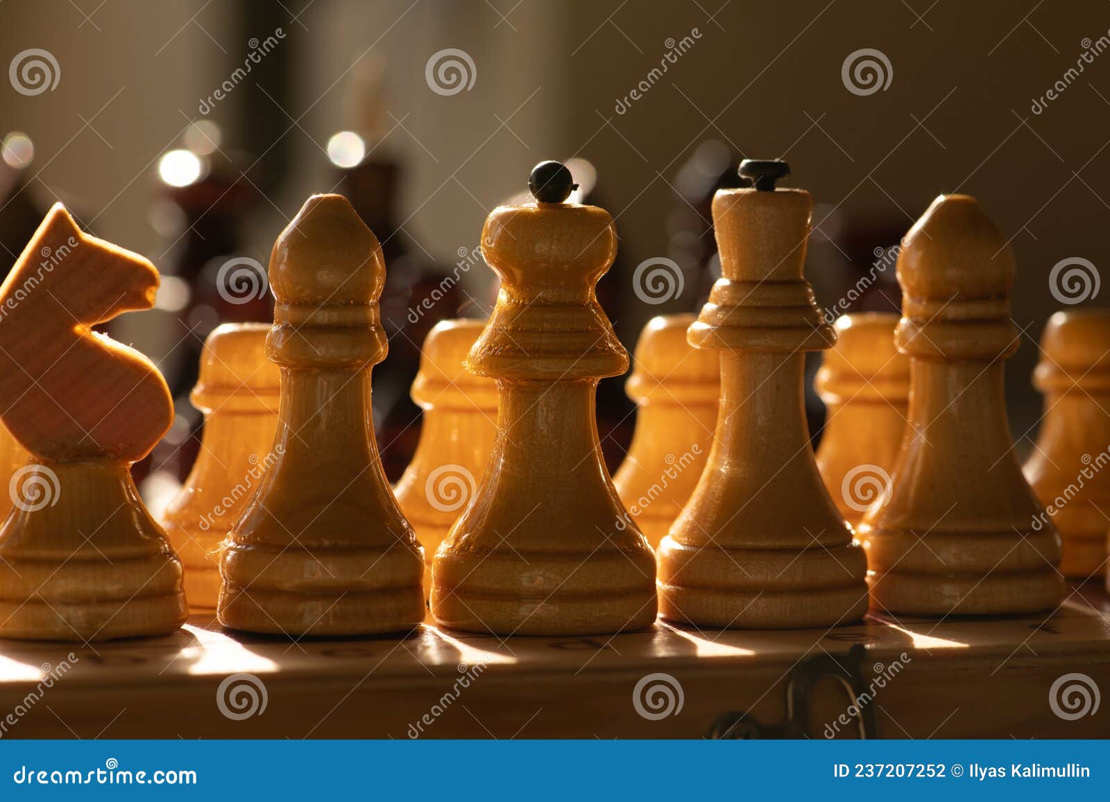 Backlit White Chess Pieces on Game Board Stock Photo - Image of chess ...