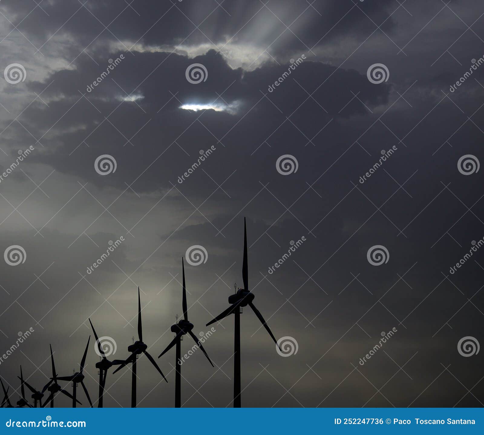 Wind Turbines at Dawn with Sun Rays Stock Photo - Image of landscape ...