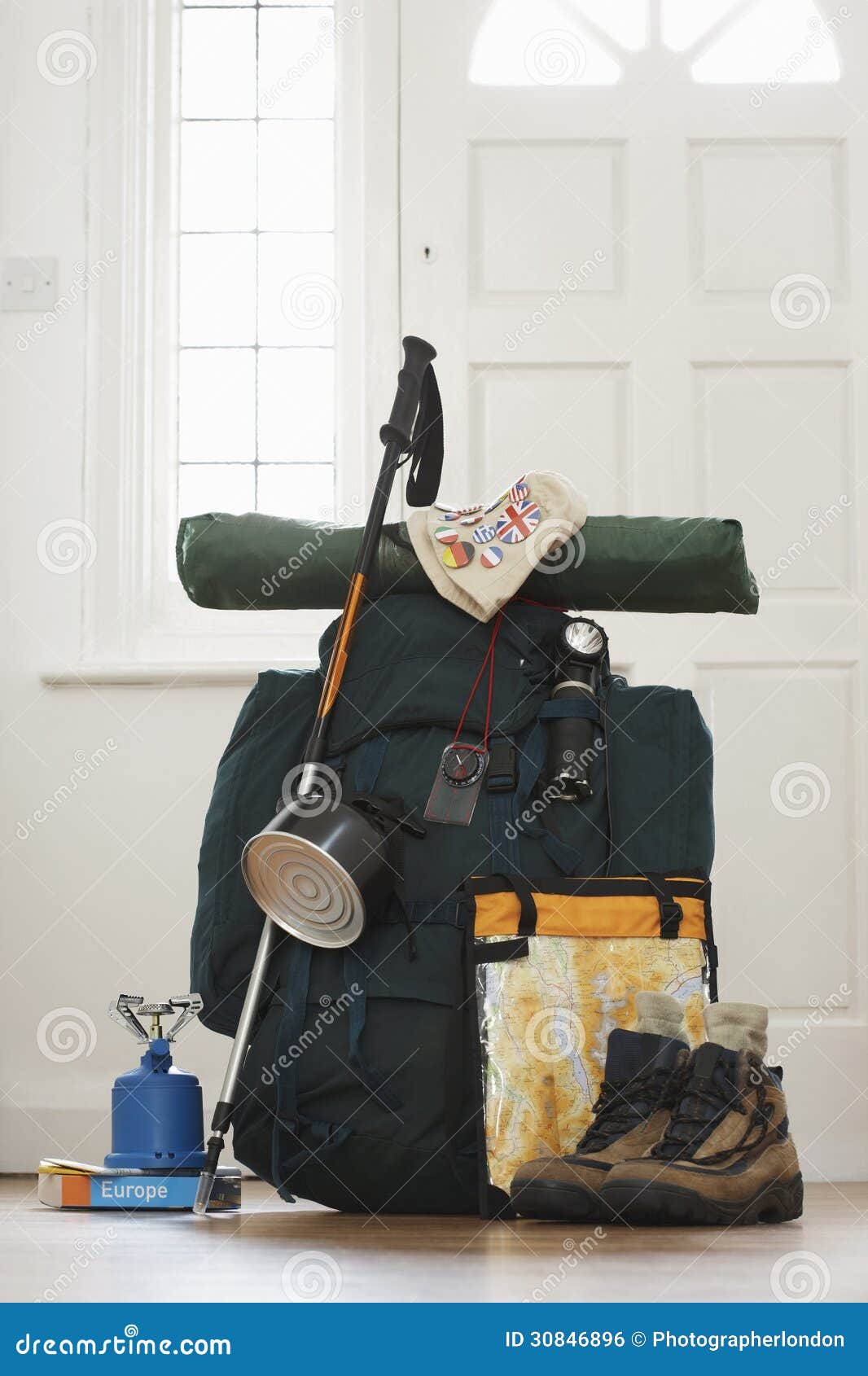 Backpack and Camping Equipment in Hallway Stock Photo - Image of kettle ...
