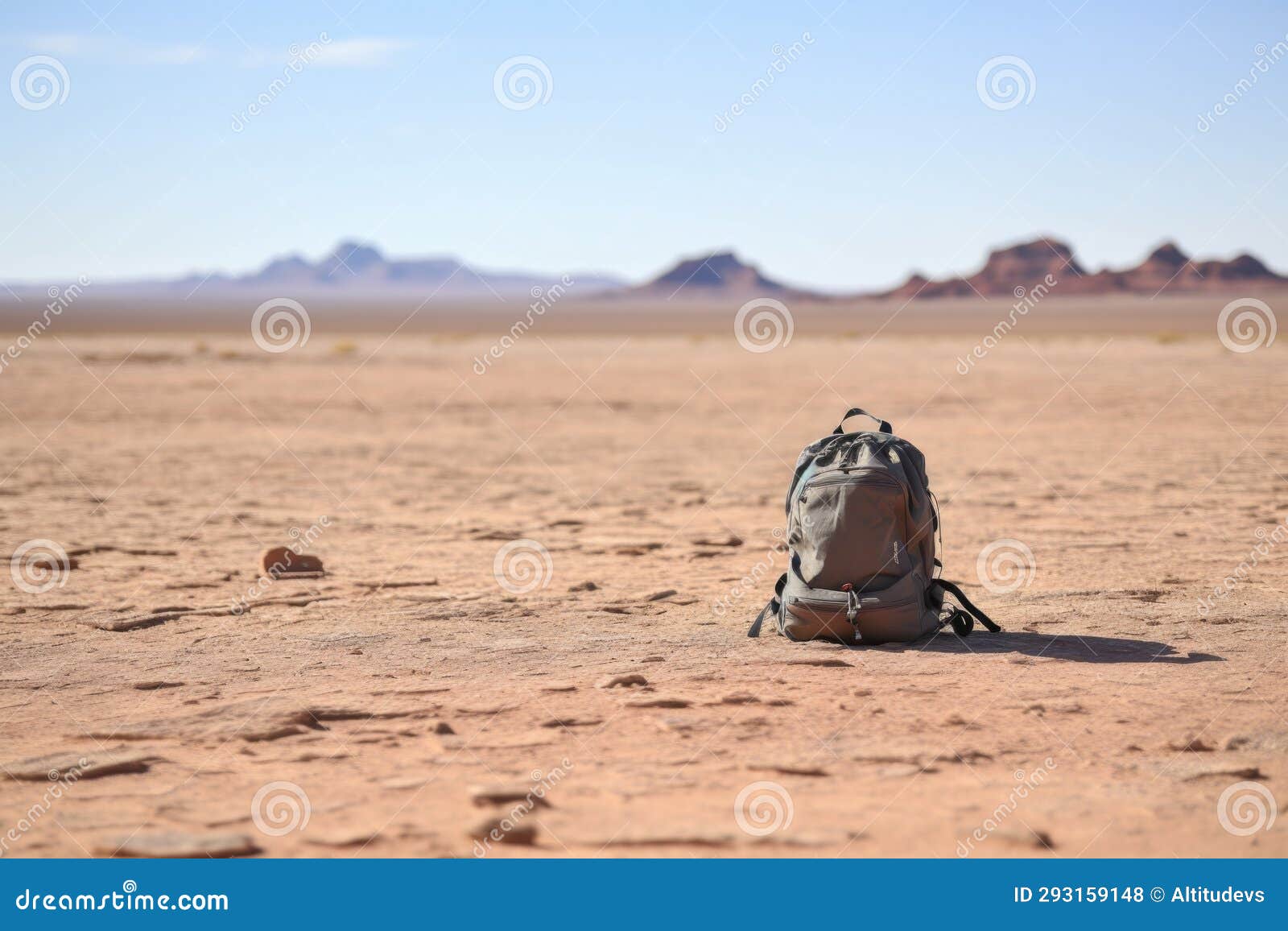 A Backpack Left Alone in an Open Desert Landscape Stock Photo - Image ...