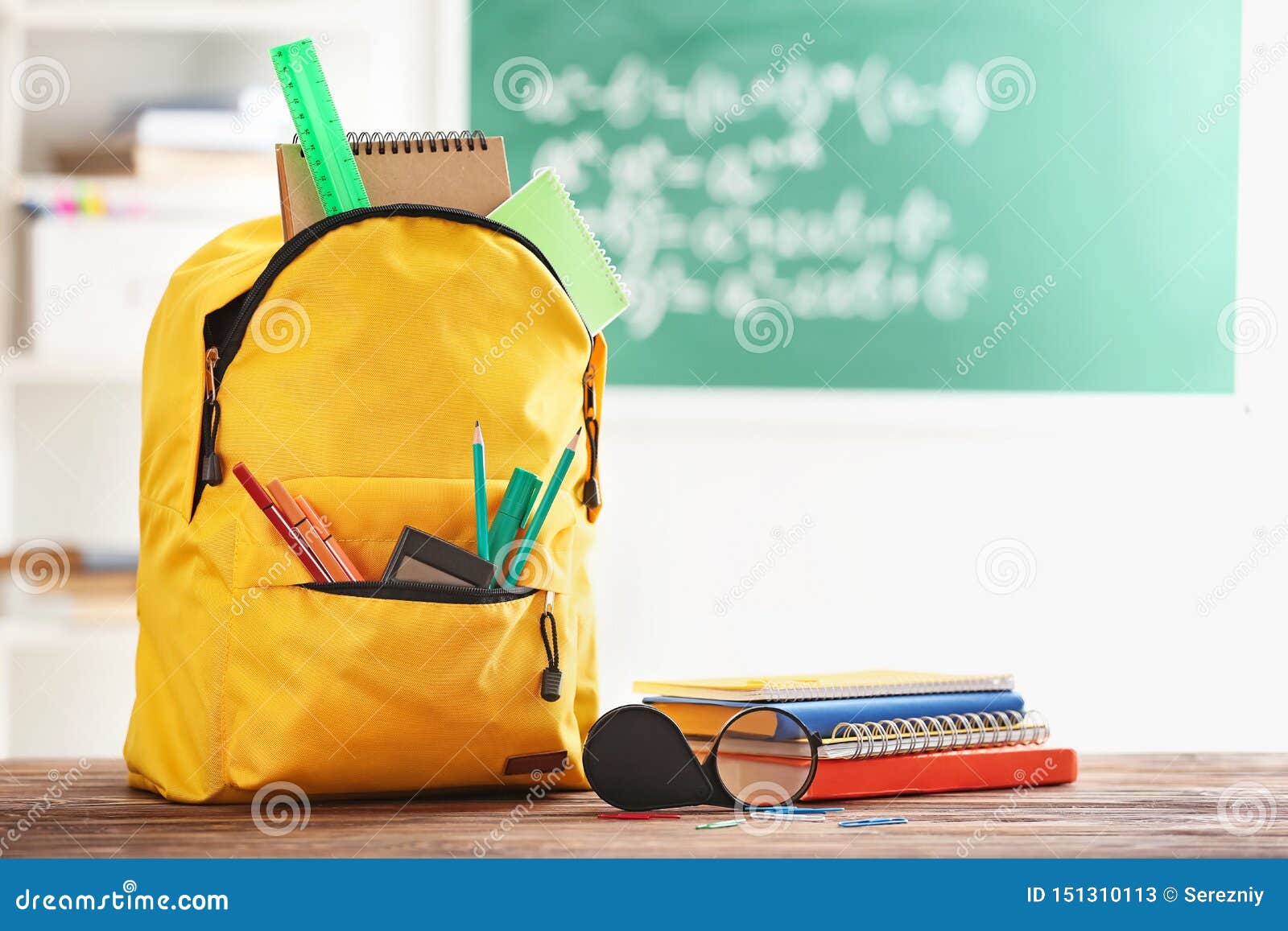 Backpack with School Supplies on Wooden Table Stock Image - Image of ...