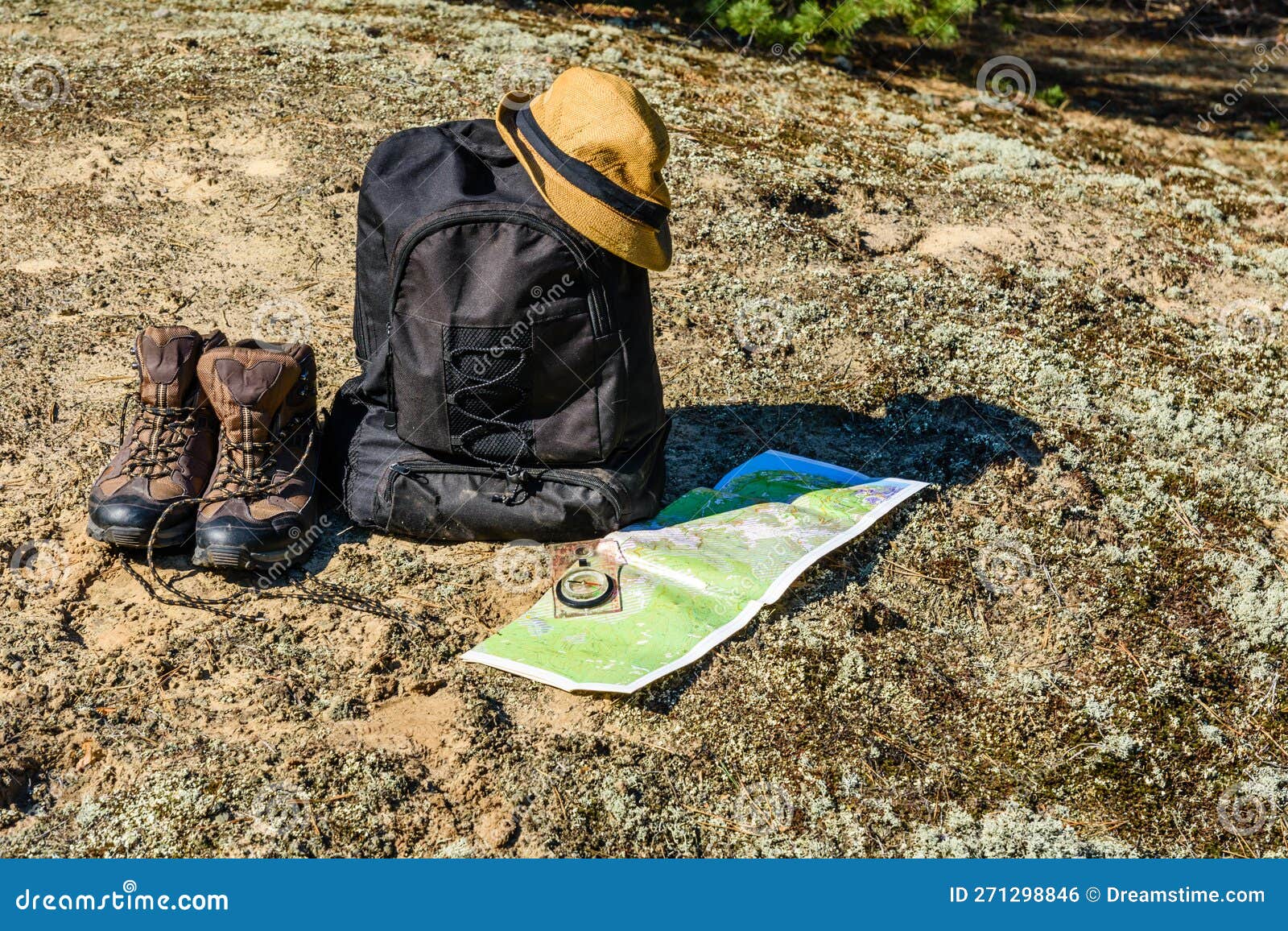 Backpack, Touristic Boots, Map, Compass and Hat on a Ground Stock Photo ...