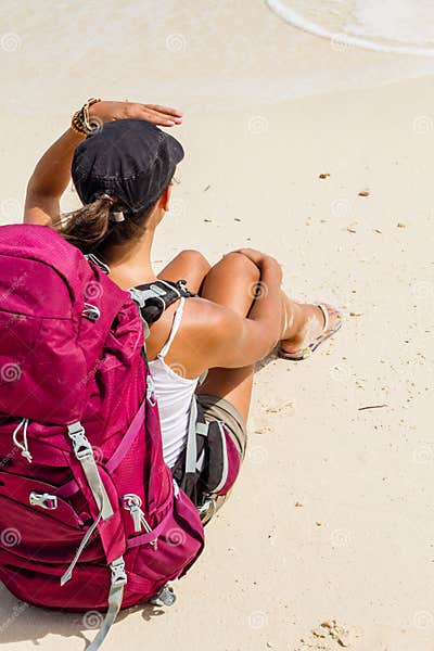 Backpacker on beach stock image. Image of young, backpacking - 26758363