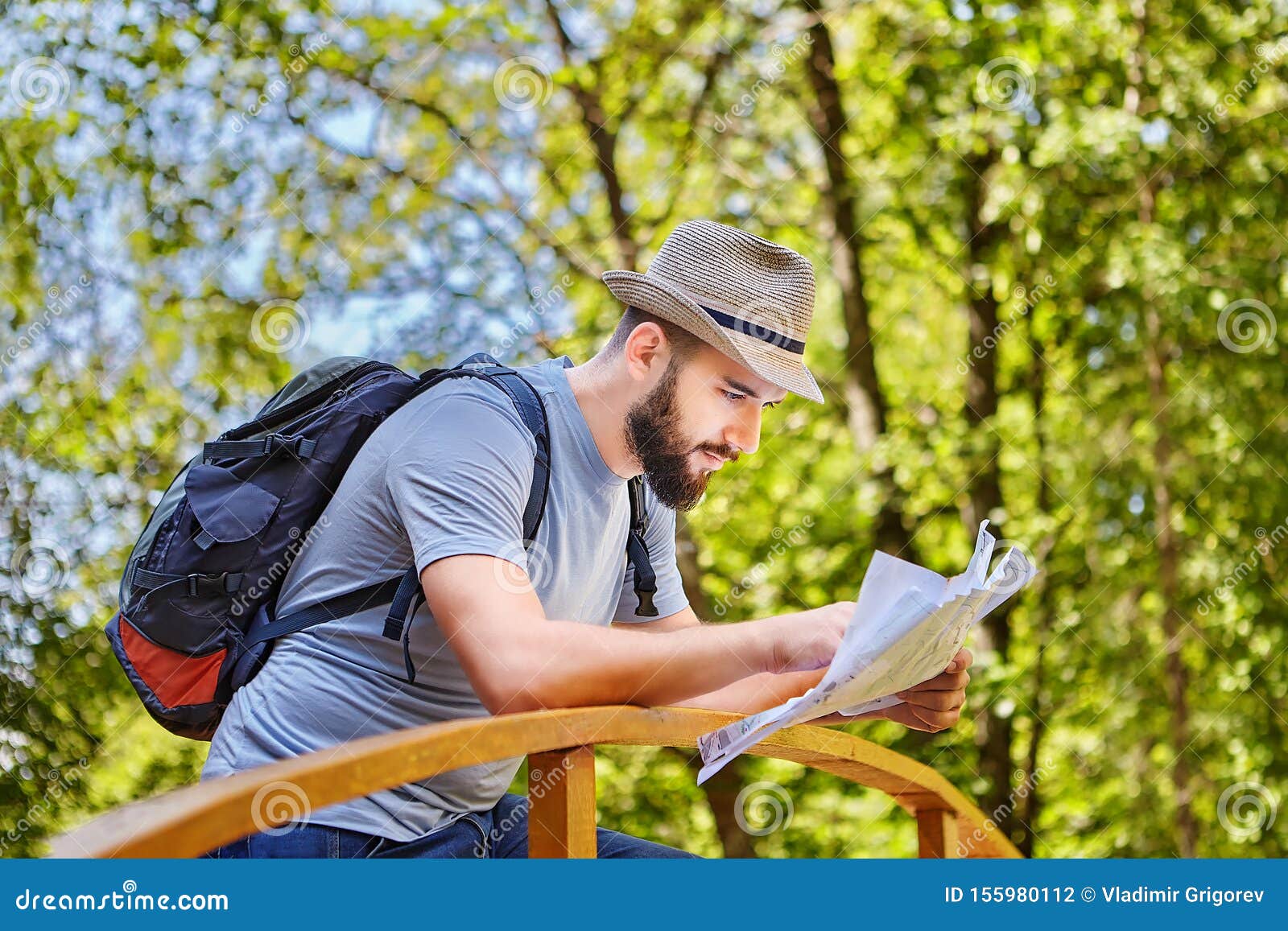 Backpacker Checks with a Map on His Route Stock Photo - Image of pretty ...