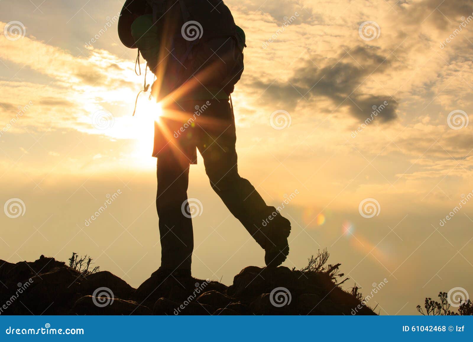 Backpacker Hiking on Sunset Mountain Peak Stock Photo - Image of cross ...