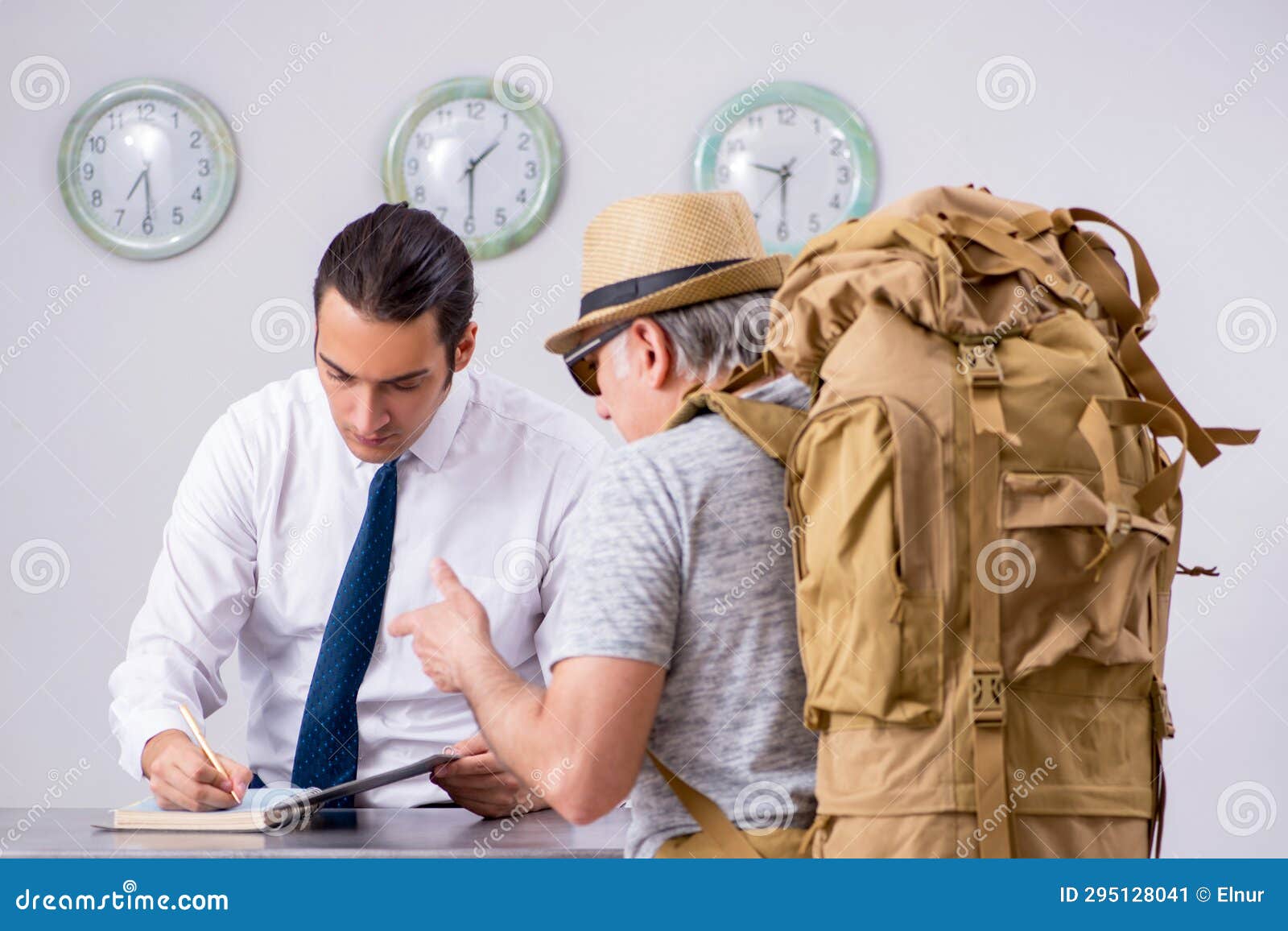 Backpacker at the Hotel Reception Stock Image - Image of guest ...