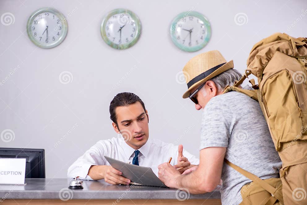 Backpacker at the Hotel Reception Stock Image - Image of accommodation ...