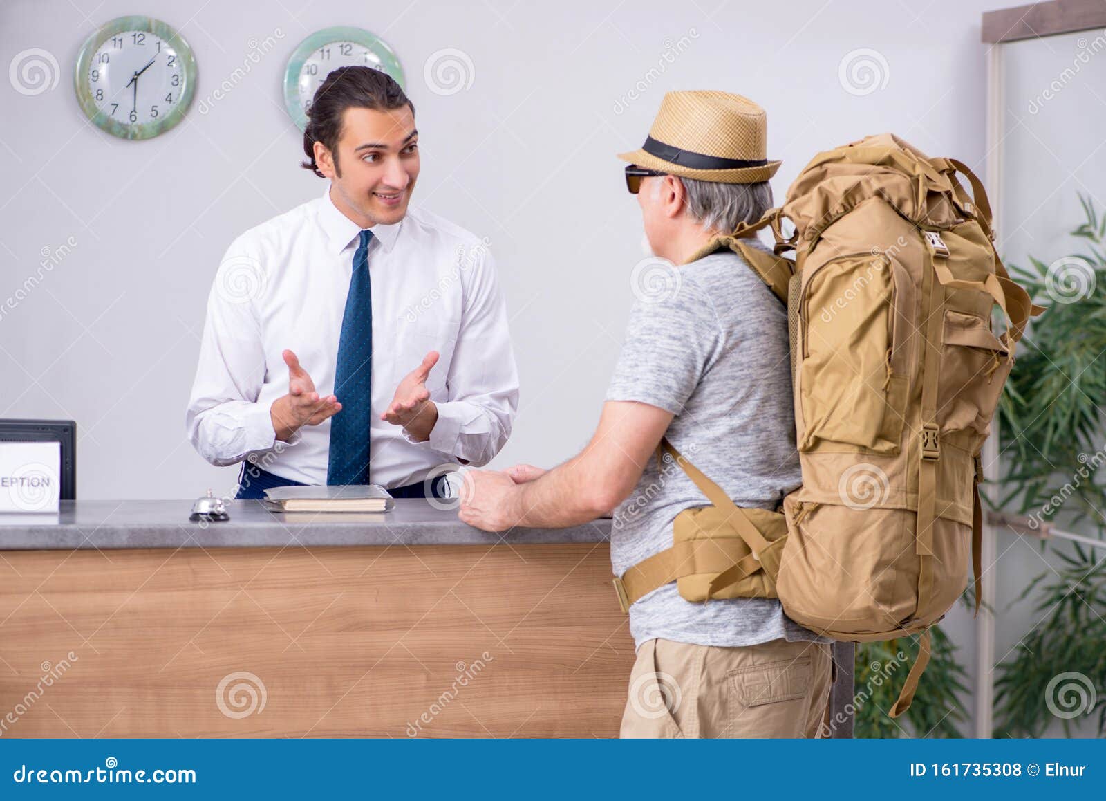 Backpacker at the Hotel Reception Stock Photo - Image of accommodation ...